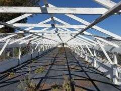 18’x135’ Wood Structure Greenhouse - RES Auction Services