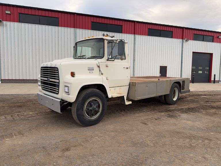 1981 Ford LN700 Flatbed Truck - RES Auction Services