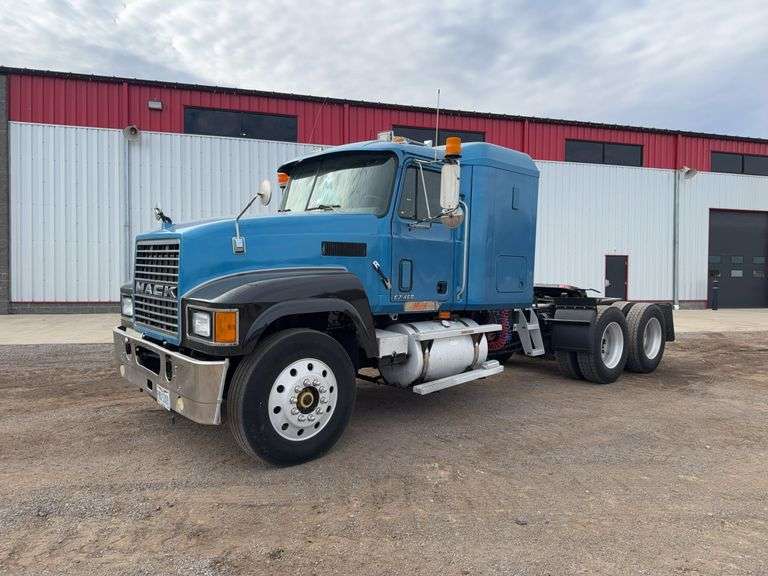 1998 Mack E7-460 Flat Top Sleeper Truck - RES Auction Services