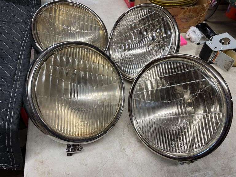 (4) Ford Headlights - RES Auction Services