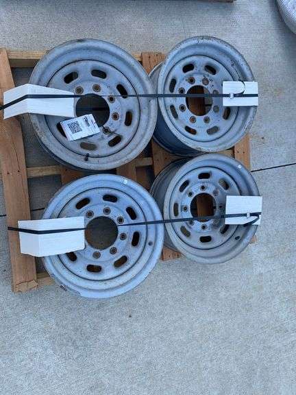 (4) Gray Steel Truck Rims - RES Auction Services