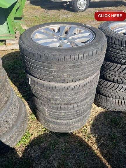 (4) 205/55R16 Tires and BMW Rims - Rideau Auctions