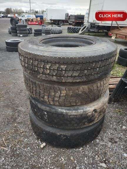 4- 11r-22.5 tires on rims - Rideau Auctions