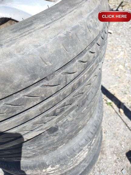 4- 205/55/16 tires on Mazda rims - Rideau Auctions