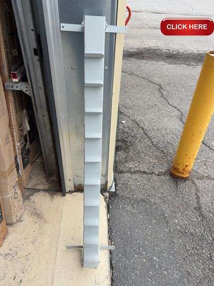 Vertical Steel Wall-Mount Rack with Multiple Angled Slots - Rideau Auctions
