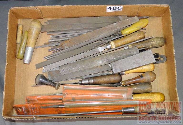 Assorted files, rasps and handles. - Rocky Mountain Estate Brokers Inc.