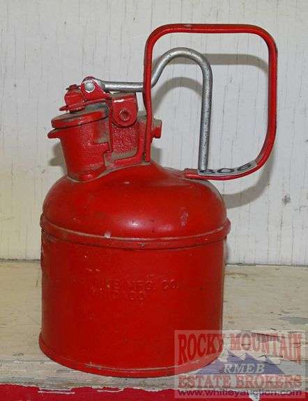 Neat Red Metal Gas-Oil Can. - Rocky Mountain Estate Brokers Inc.