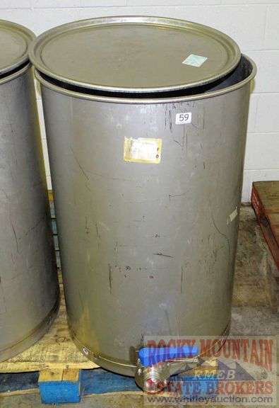 Approximate 70 gallon stainless steel drum with food grade valve and ...