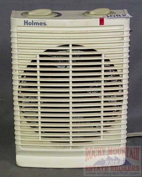 9" Holmes electric heater. - Rocky Mountain Estate Brokers Inc.