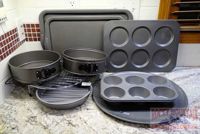 Spring form pans, muffin tins, cooling racks, and assorted bakeware ...