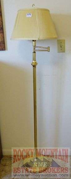 Brass swing arm floor lamp. 60" high. - Rocky Mountain Estate Brokers Inc.