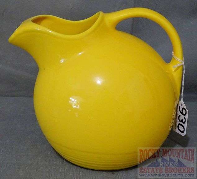 Vintage yellow ball pitcher, 8" high. - Rocky Mountain Estate Brokers Inc.