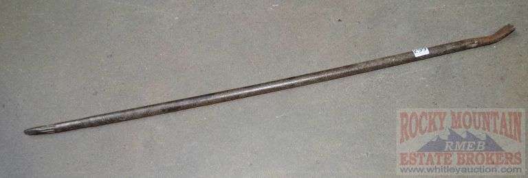 Heavy duty steel digging bar. - Rocky Mountain Estate Brokers Inc.