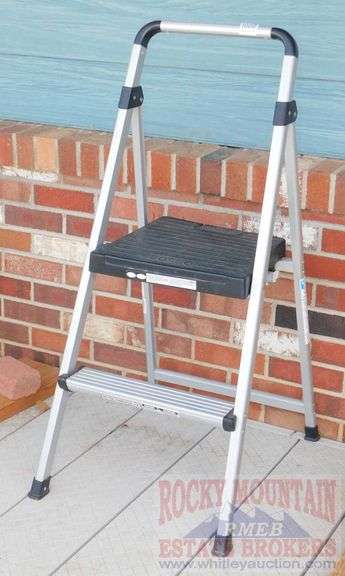 Cosco folding step stool. - Rocky Mountain Estate Brokers Inc.