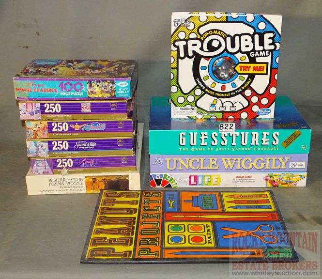 Disney puzzles & assorted board games. We do not know if the puzzles ...