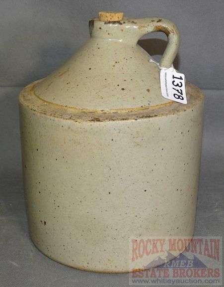 10" Vintage Crock Jug with Cork. - Rocky Mountain Estate Brokers Inc.