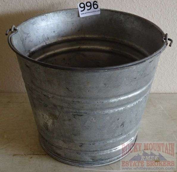 Galvanized Bucket. - Rocky Mountain Estate Brokers Inc.