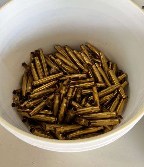 1/2 Full, Large Bucket of Primed 30-06 Brass Shell Casings. Bucket is marked "New Winchester 30 ...