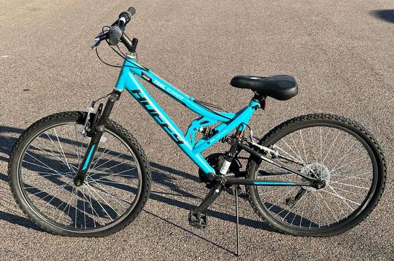 Huffy Twenty Four Trail Runner Bike. - Rocky Mountain Estate Brokers Inc.