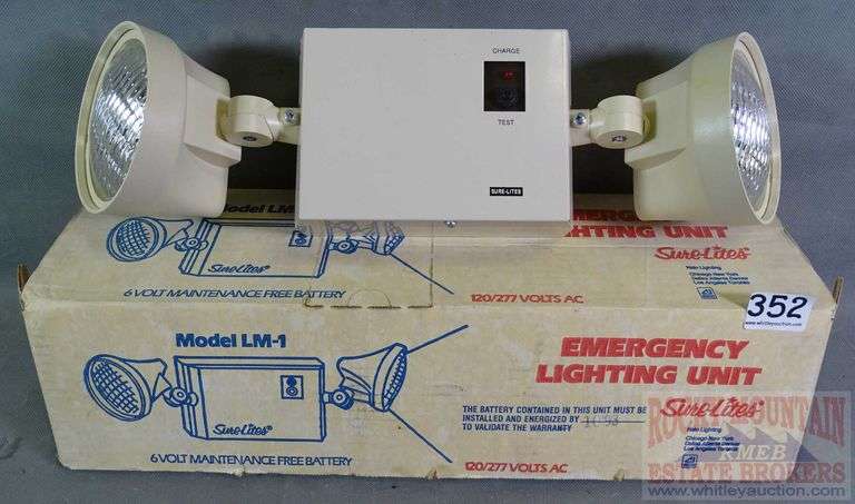 Sure-Lites Model LM-1 Emergency Lighting Unit In Box. This appears to ...