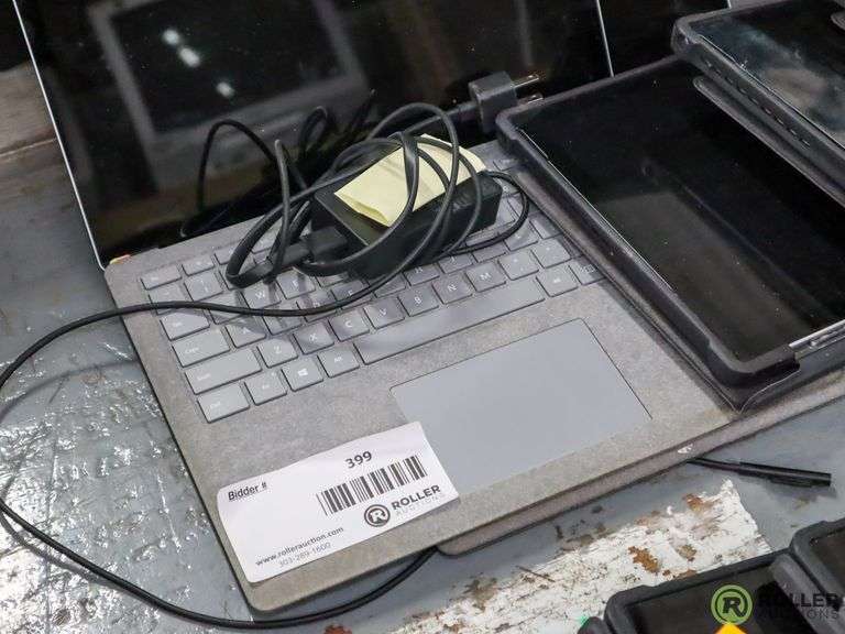 (5) Microsoft Surface Tablets and (2) Microsoft Surface 1769 Laptops - Roller Auctions