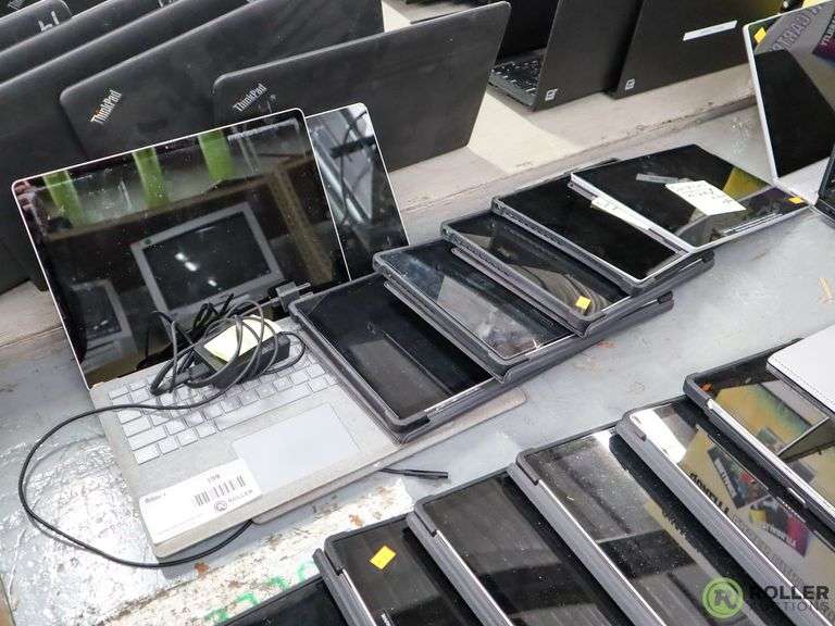 (5) Microsoft Surface Tablets and (2) Microsoft Surface 1769 Laptops - Roller Auctions