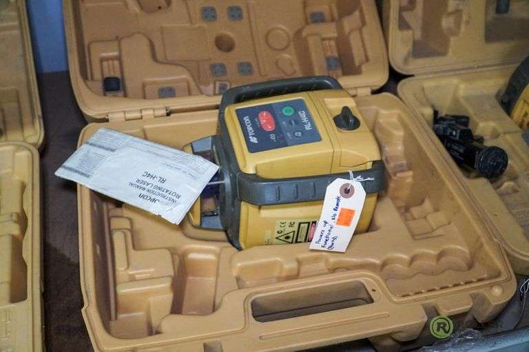 Shelf of Inoperable Topcon Transit Levels and Tripod - Roller Auctions