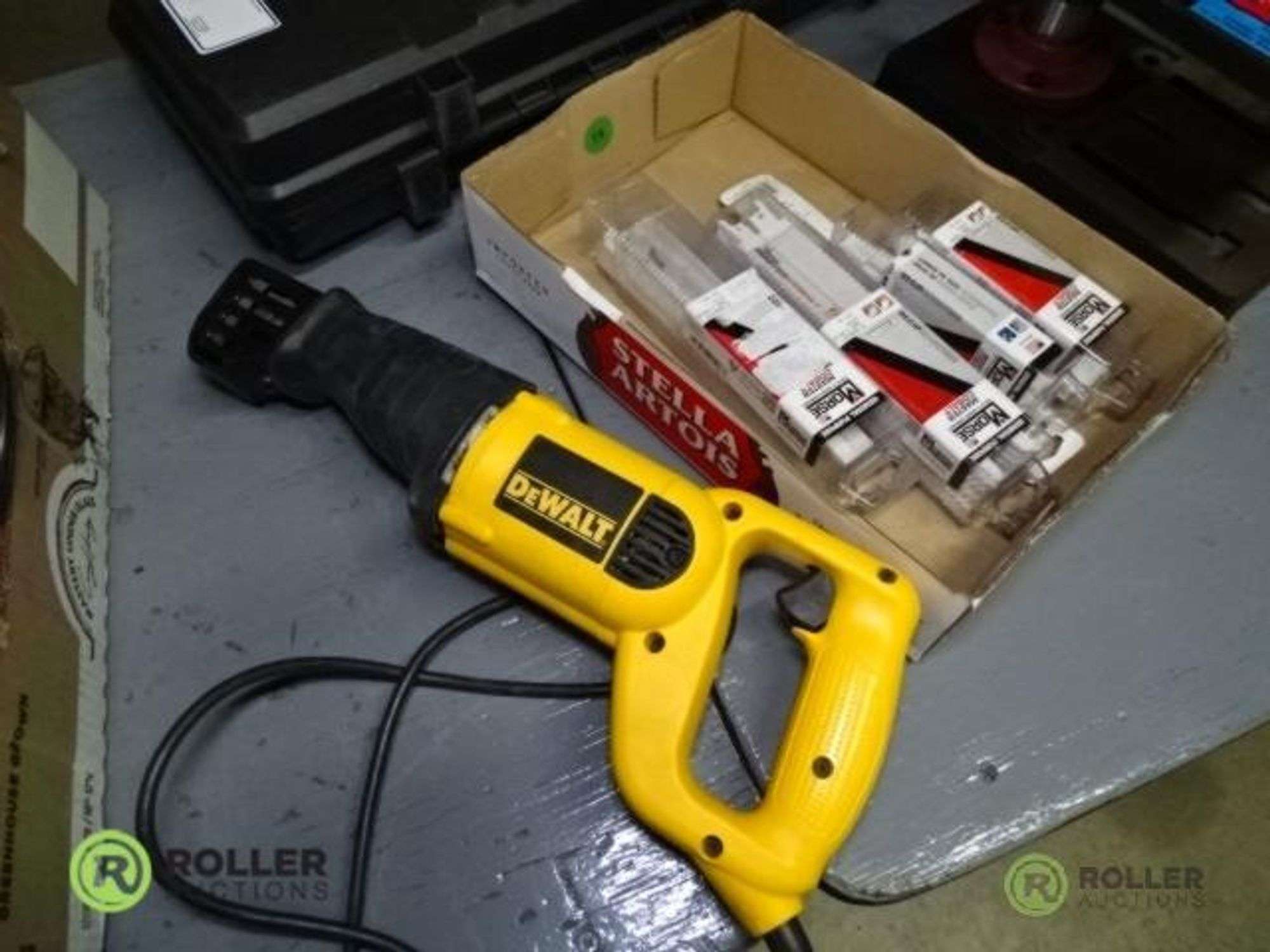 DeWalt DW303M Reciprocating Saw With Case and Assorted Size Blades Roller Auctions
