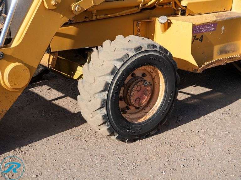 Case 570XLT 4WD Tractor/Loader - Roller Auctions