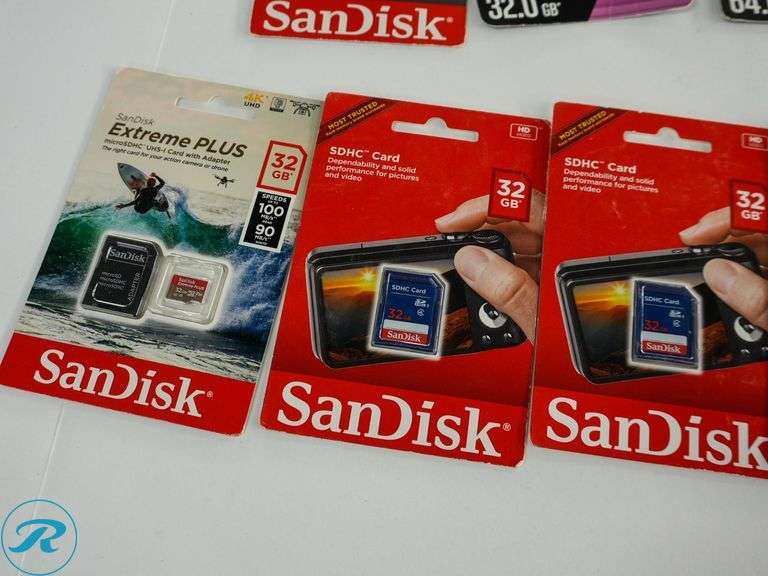 (8) San Disk Memory Cards - Roller Auctions
