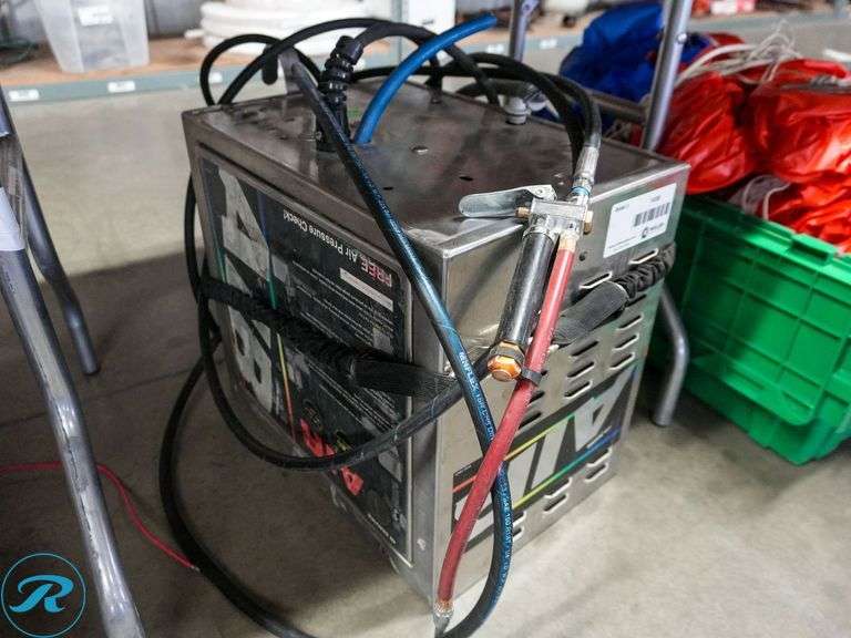 J.E. Adams Coin Operated Air Compressor - Roller Auctions