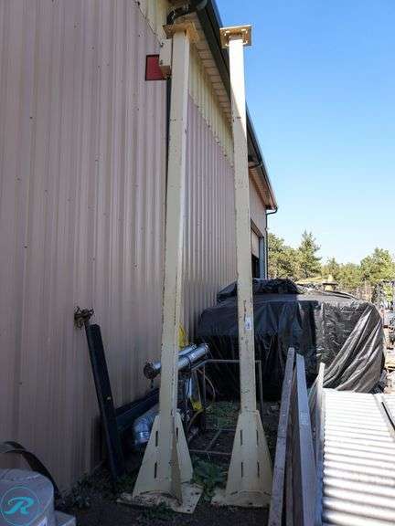 (2) Steel Posts, Approximately 10' Tall - Roller Auctions