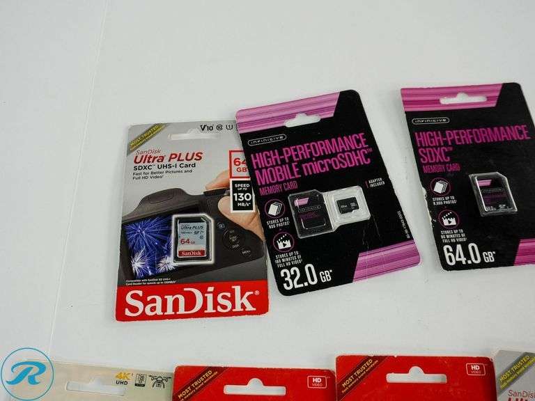 (8) San Disk Memory Cards - Roller Auctions