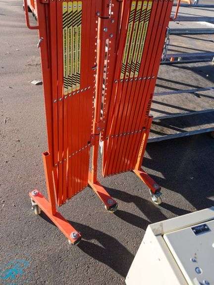 (2) 6-Tier Shop Carts and Expol Sentry Gate on Casters - Roller Auctions