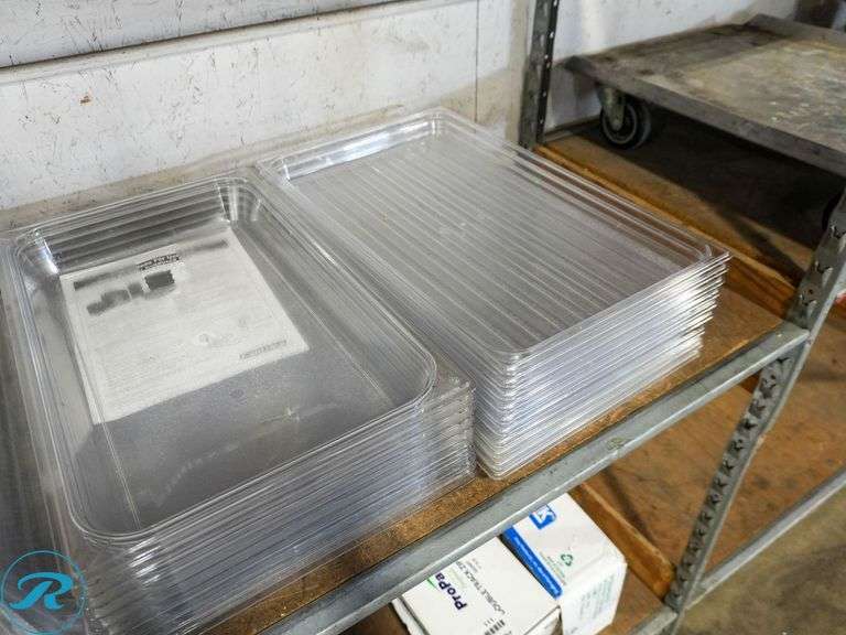 Shelf of Bakery Serving Trays and Lids - Roller Auctions
