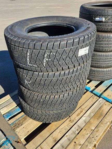 (4) 2021 Bridgestone Blizzak DM-V2 265/70R16 112R Tires - Roller Auctions