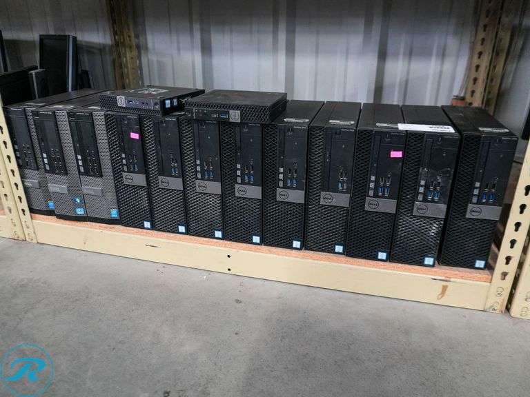 Shelf of Dell CPUs - Roller Auctions