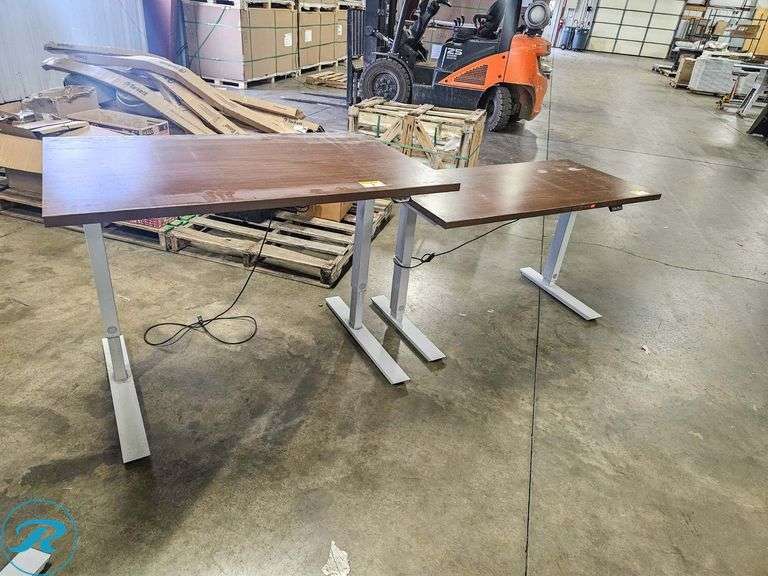 (2) ESI Adjustable Work Stations - Roller Auctions