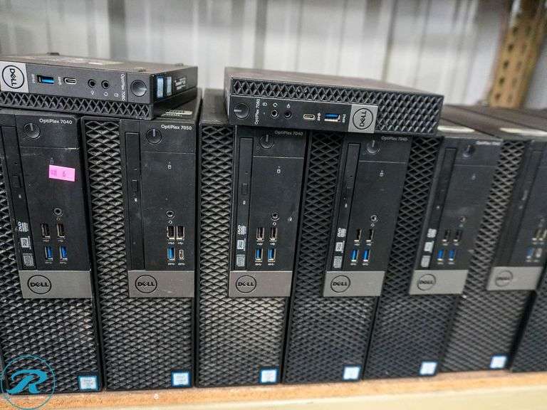 Shelf of Dell CPUs - Roller Auctions