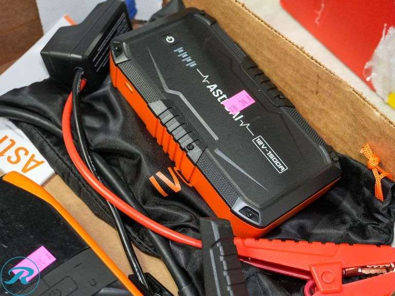 Tray Of ASTROVI Jump Starter and Kapono Portable Air Compressor ...