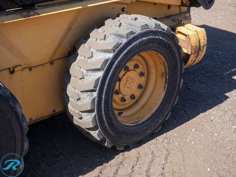 1997 New Holland LX665 Skid Steer Loader - Roller Auctions