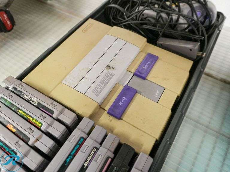 Super Nintendo, Controllers and Games - Roller Auctions