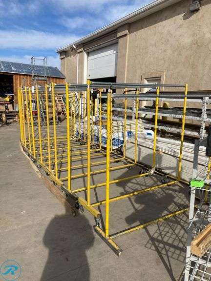 (11) Heavy Duty Clothing/Storage Racks with Rolling Wheels (9 complete ...