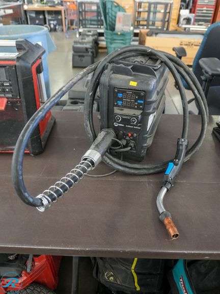 Miller Arc Reach Suitcase 8 Mig Welder, 120V - Roller Auctions