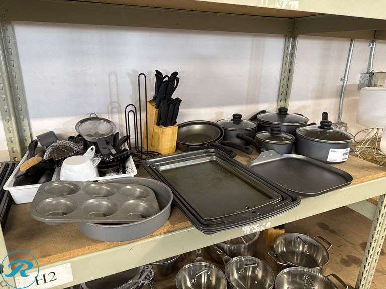 Shelf of Assorted Cookware and Utensils, Including Pots, Pans, and Baking Trays - Roller Auctions
