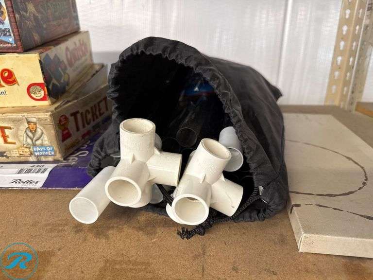 Lot of Board Games, PVC Game Accessories, and VHS Tapes - Roller Auctions