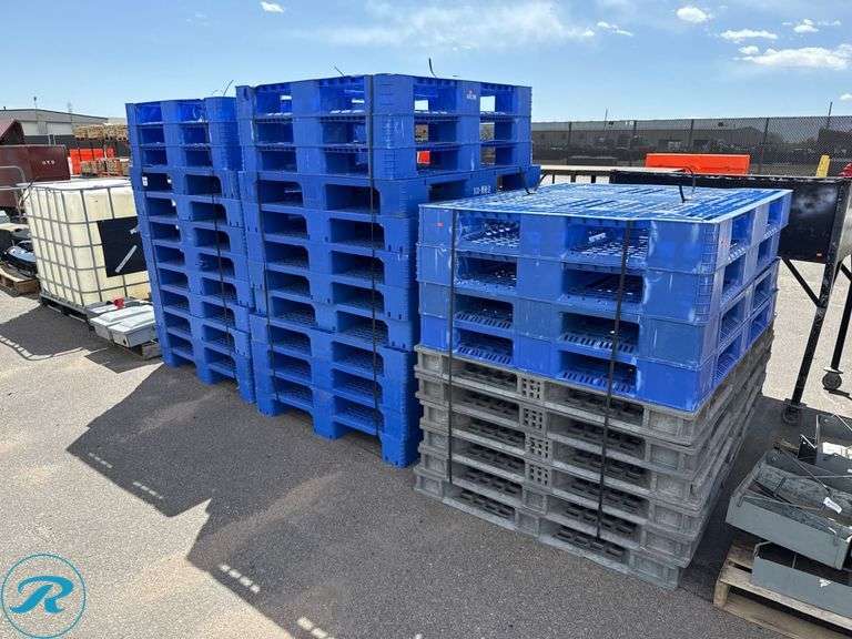 (3) Stacks of Plastic Pallets - Roller Auctions