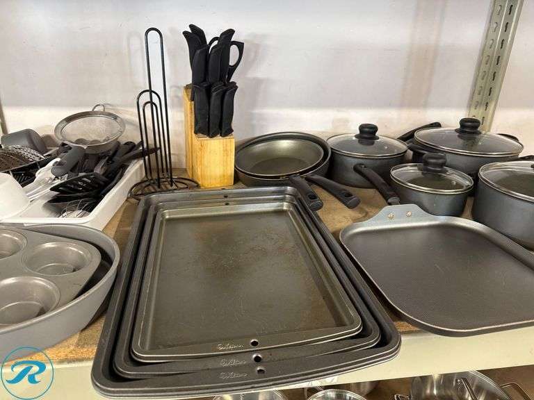 Shelf of Assorted Cookware and Utensils, Including Pots, Pans, and Baking Trays - Roller Auctions