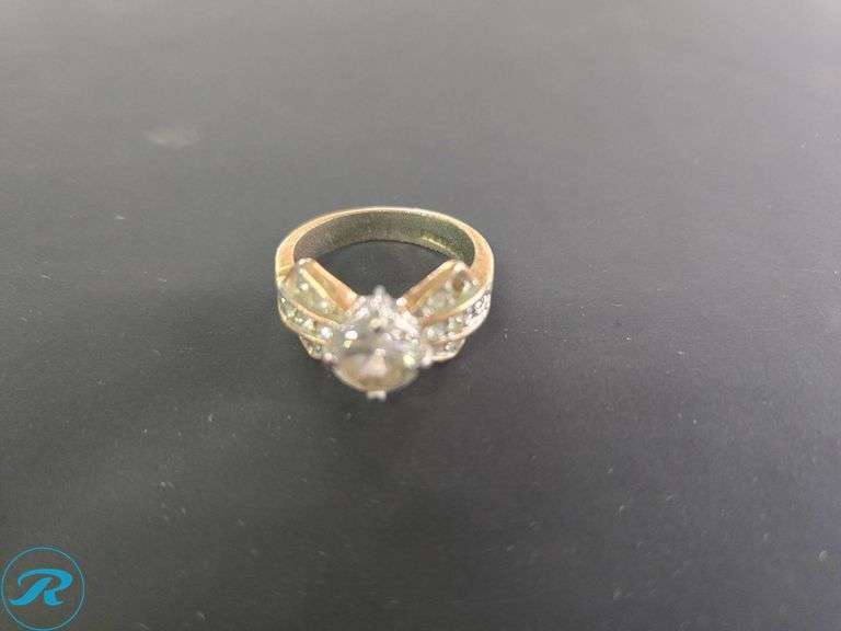 Gold Tone Ring with Central Gemstone and Pave-Style Detailing - Roller Auctions