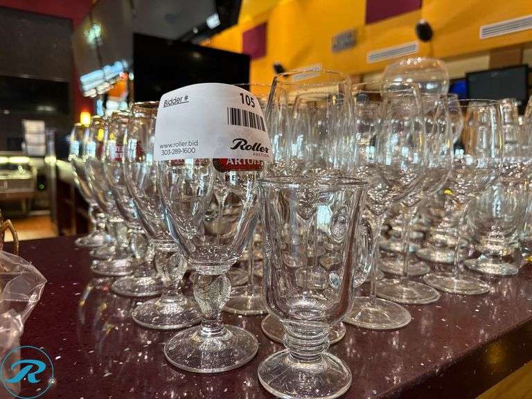 Assorted Glassware Including Stemware, Goblets, and Stella Artois Glasses - Roller Auctions